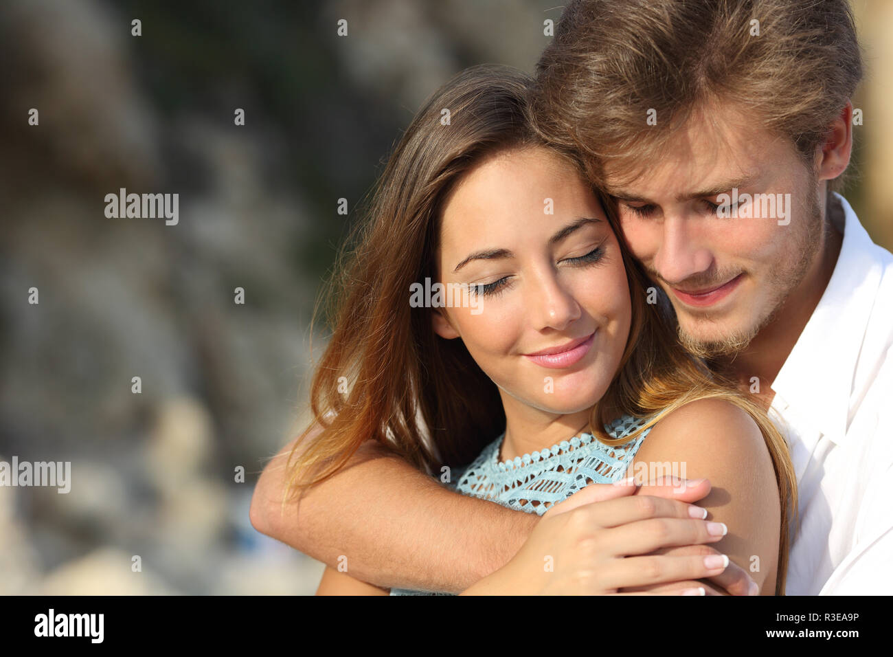 Couple in love hugging and feeling the romance Stock Photo - Alamy