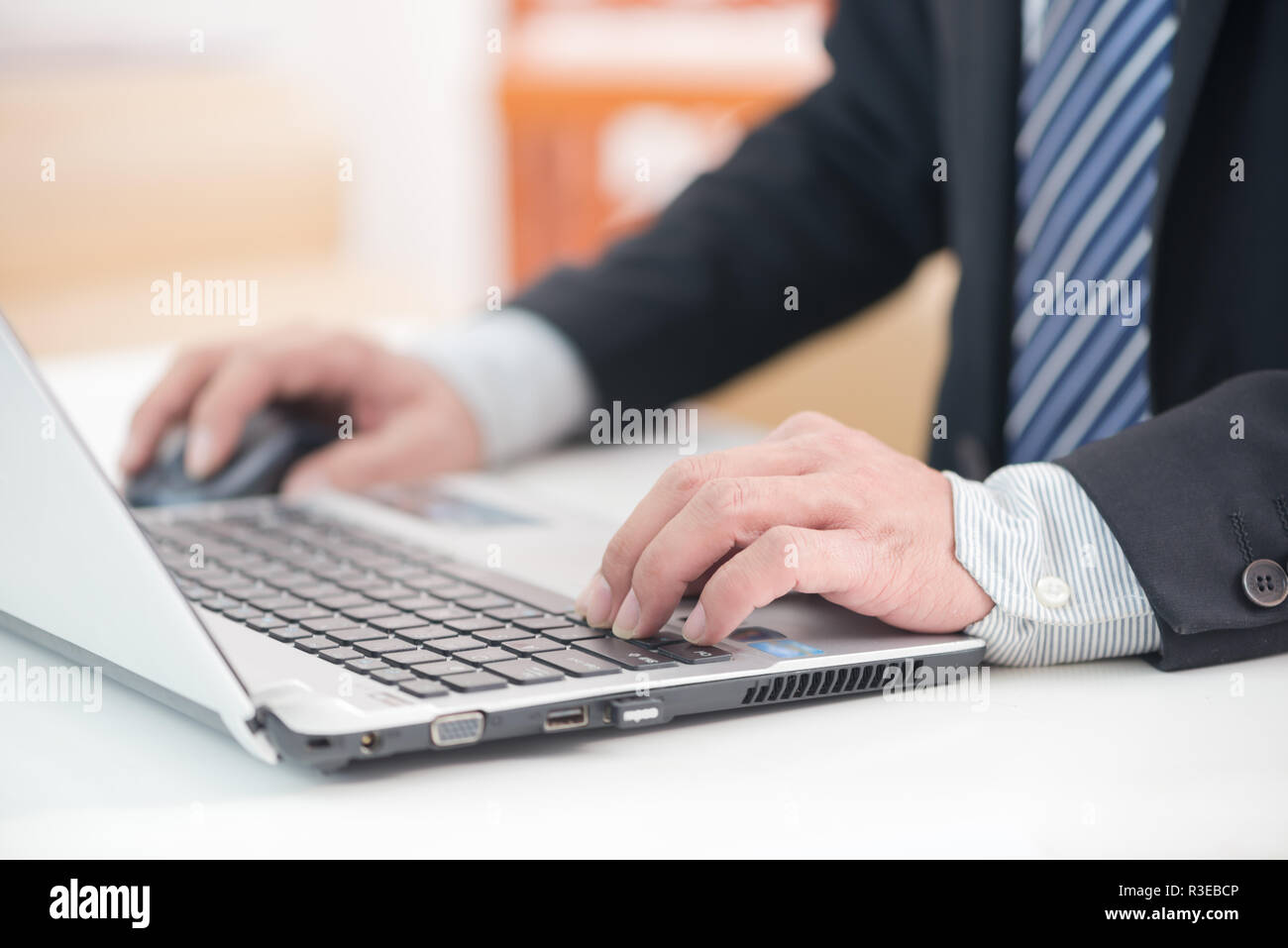 Image of businessman's hands laying on table with pen Stock Photo - Alamy