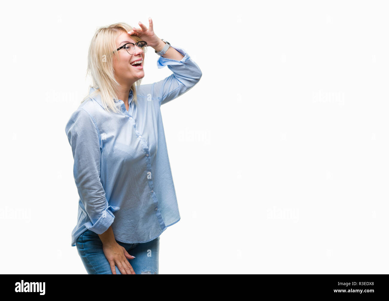 Young beautiful blonde business woman wearing glasses over isolated ...