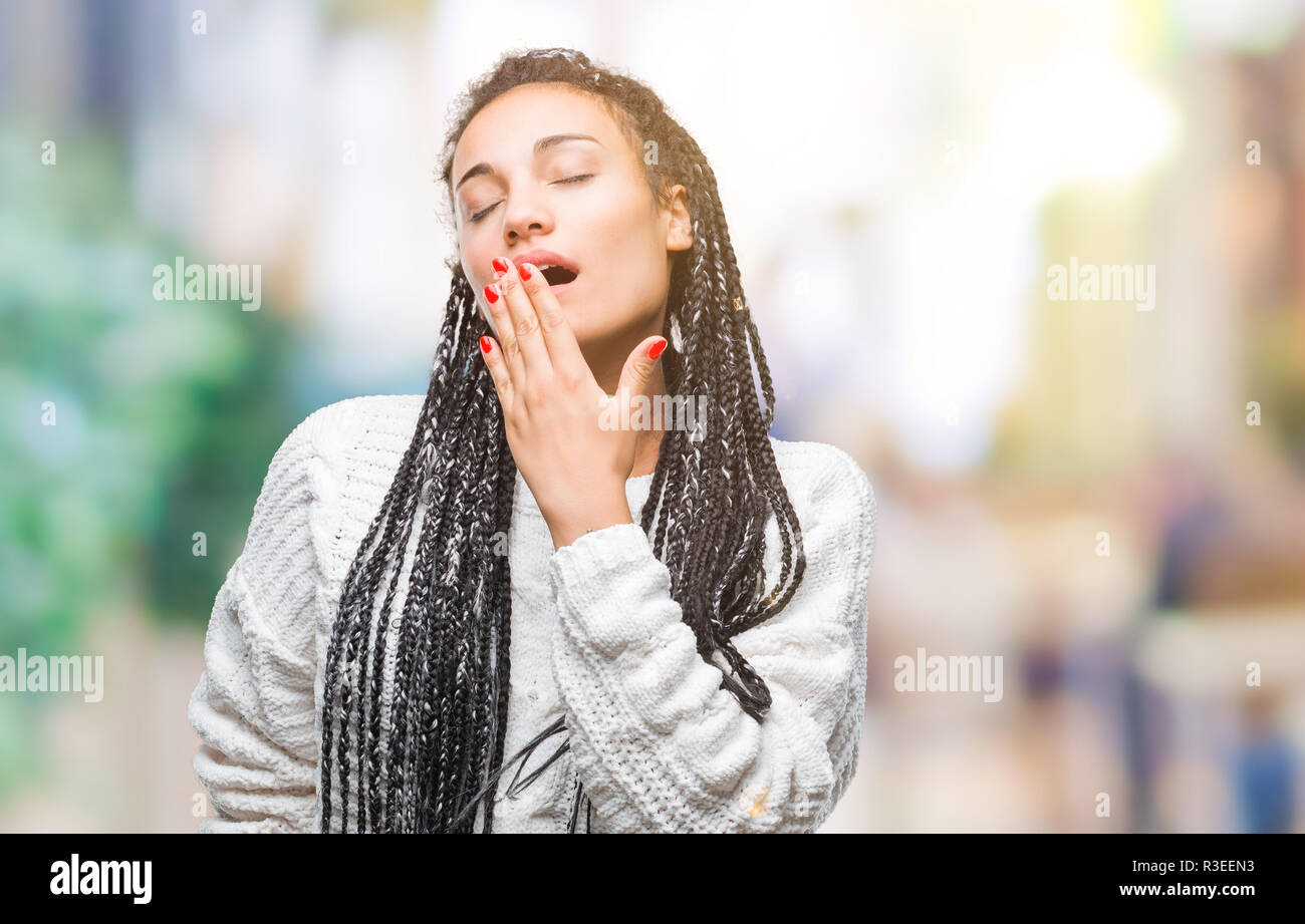 Young braided hair african american girl wearing sweater over isolated ...