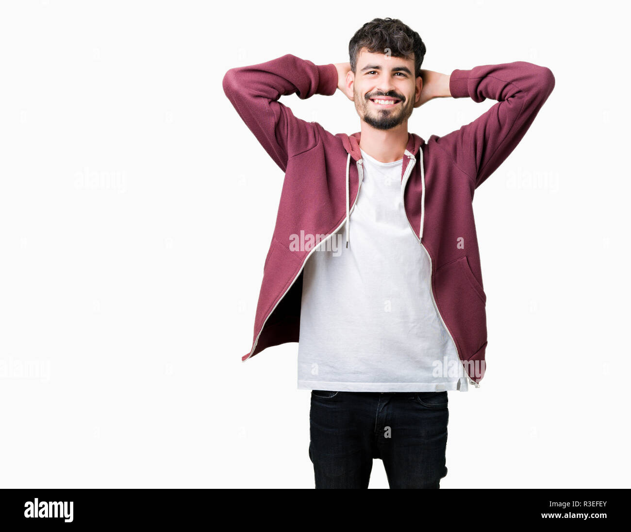 Young handsome man over isolated background Relaxing and stretching ...