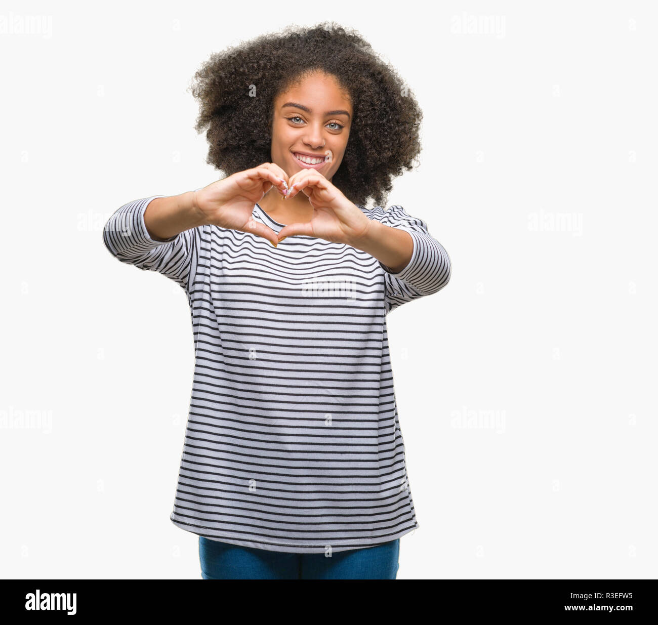 Young afro american woman over isolated background smiling in love ...