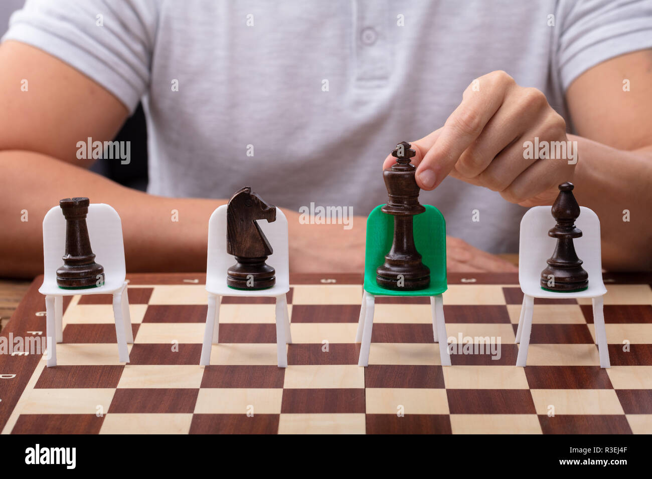 Man holding chess piece people hi-res stock photography and images - Alamy