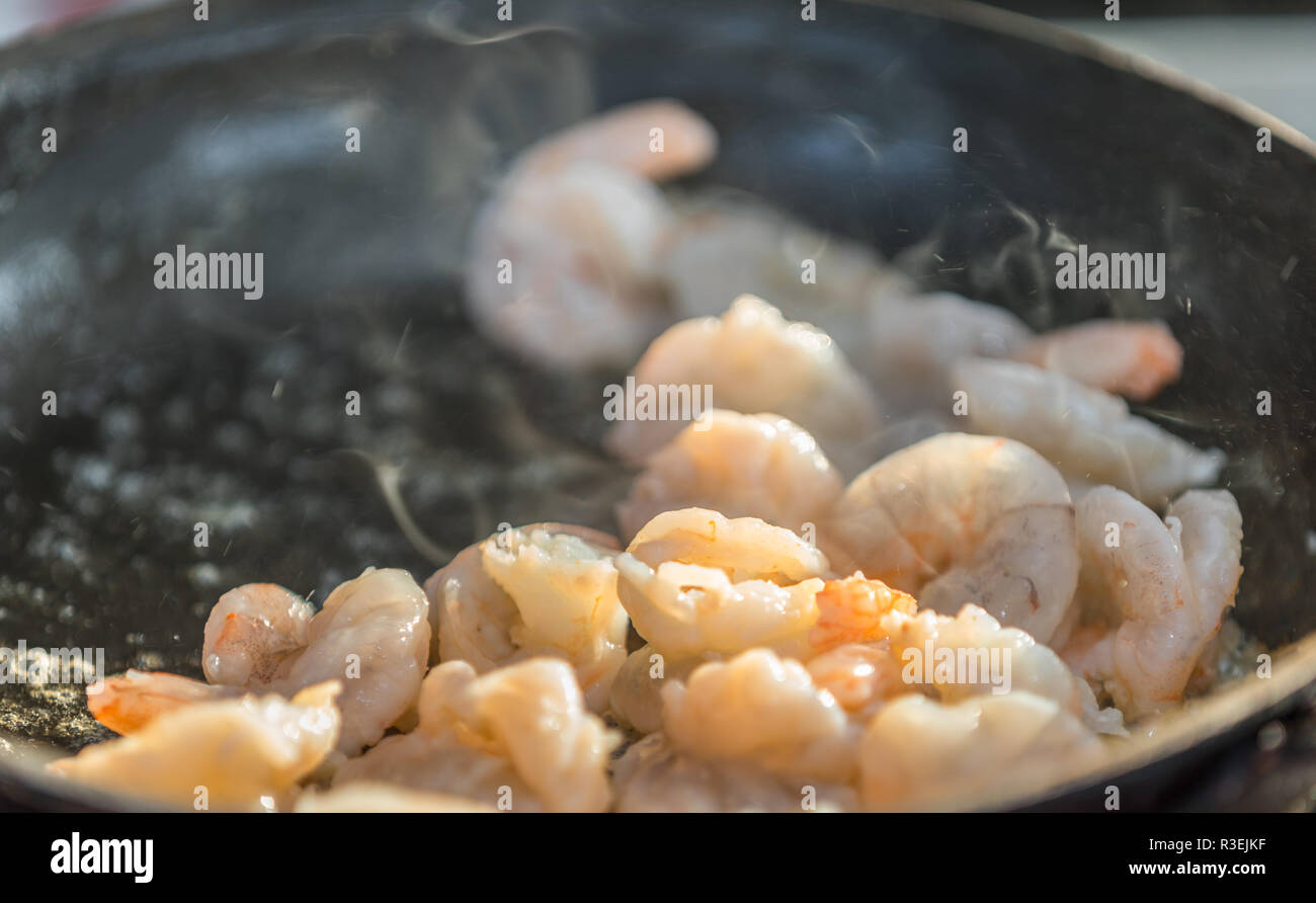 shrimp being cooked in a skillet Stock Photo - Alamy