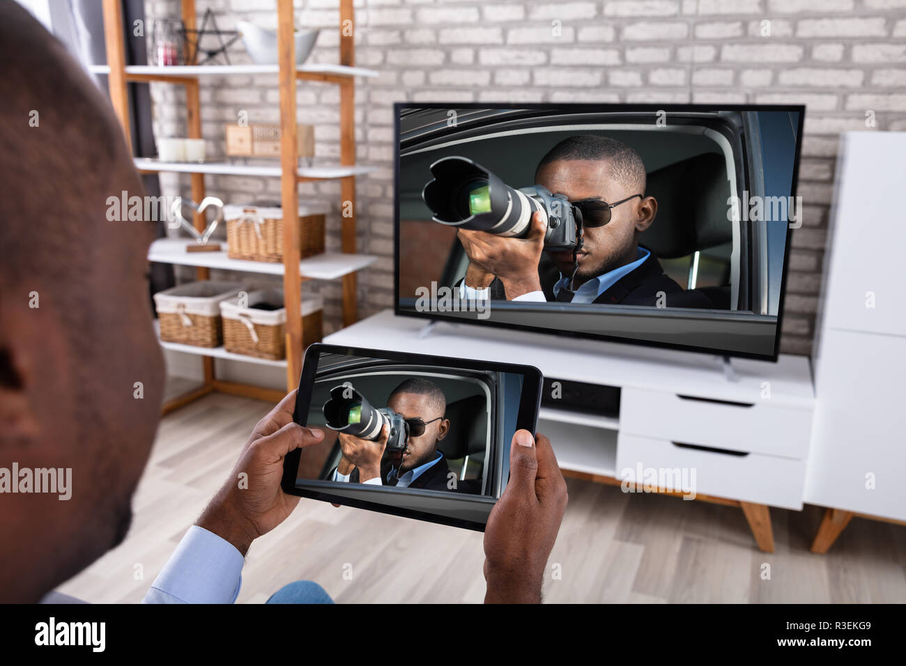 Using Smartphone Watching Tv High Resolution Stock Photography and ...