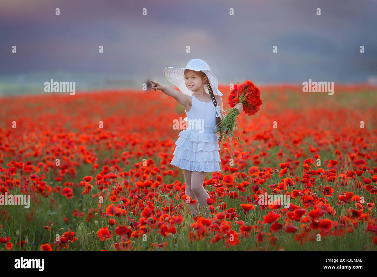 amazing close up portrait of lovely cute young romantic girl with poppy ...