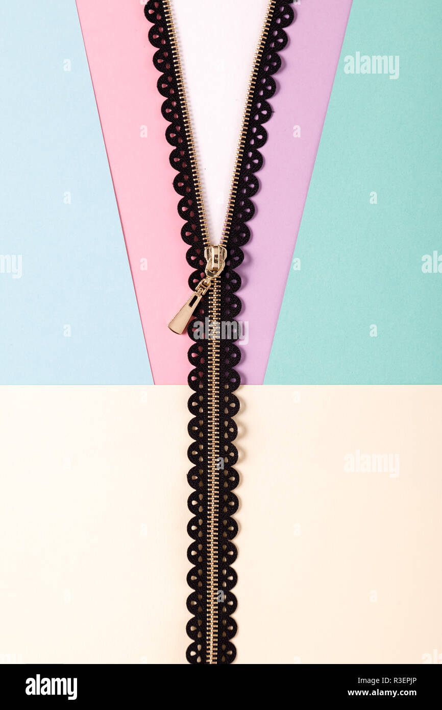 colored paper zipper. colors are connected by zipper Stock Photo - Alamy