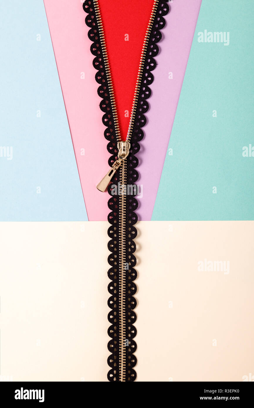 colored paper zipper. colors are connected by zipper Stock Photo - Alamy