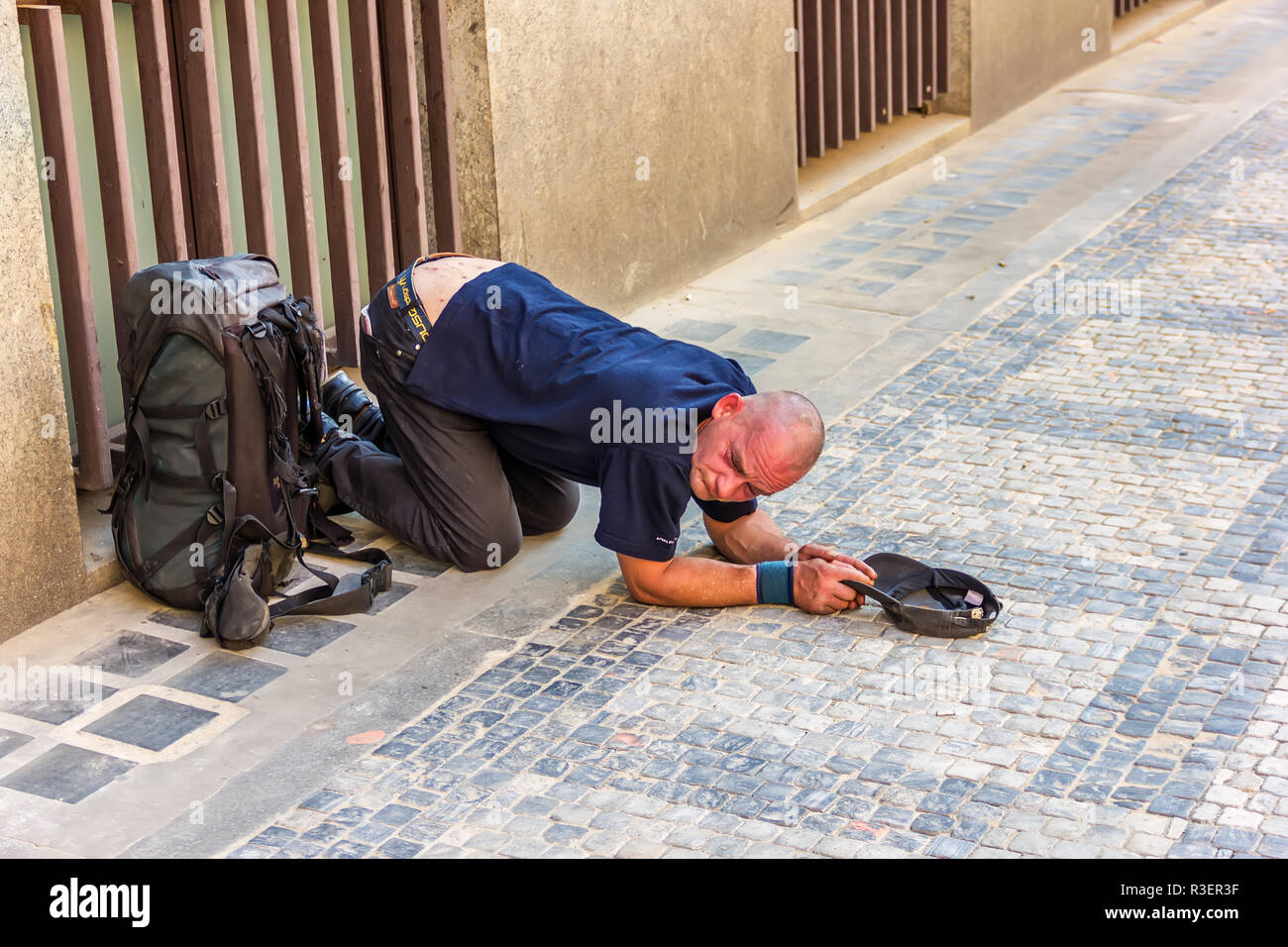 Sitting town begging beggar hi-res stock photography and images - Alamy