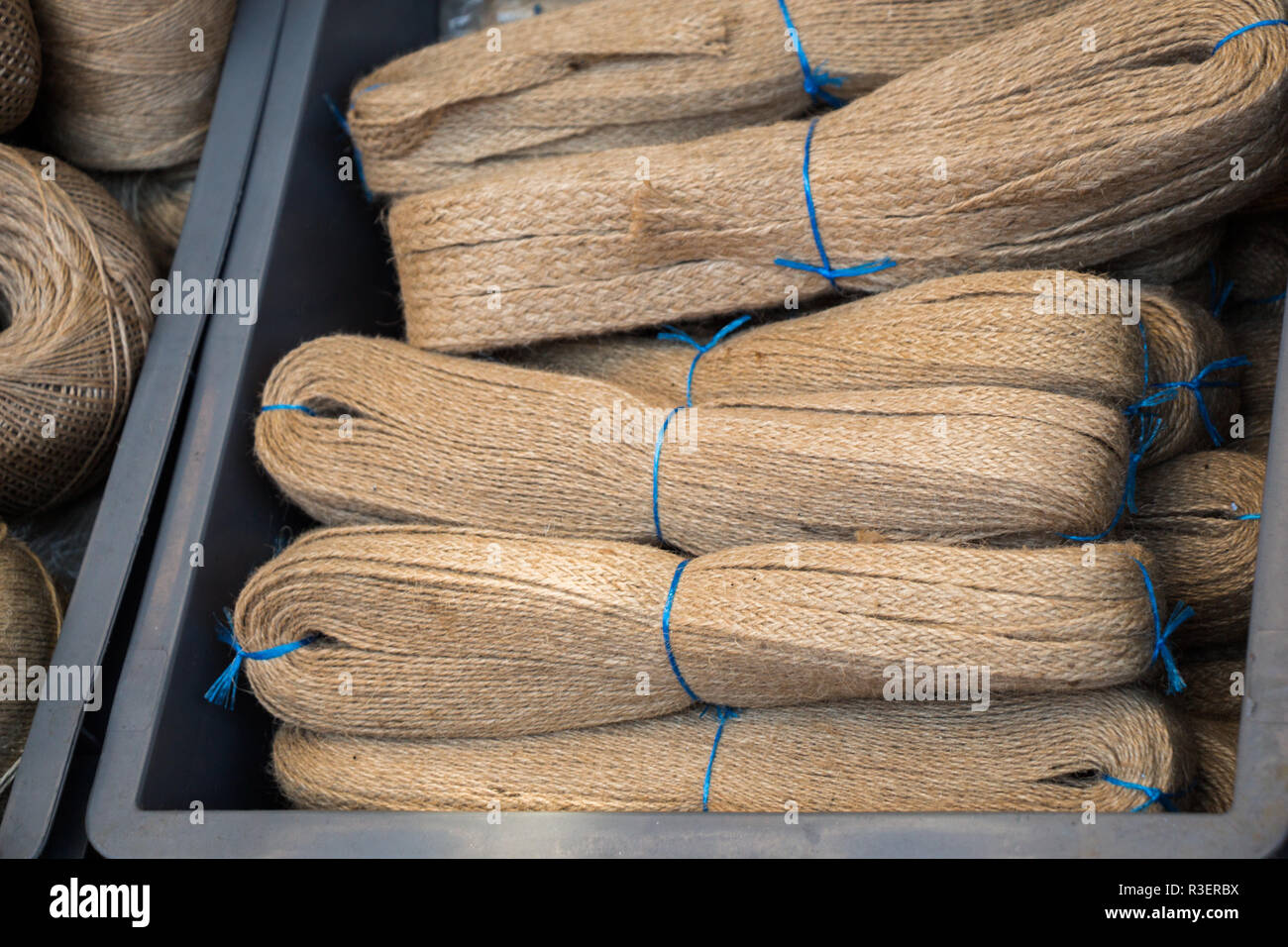 Bundle of rope in view in a market place Stock Photo - Alamy