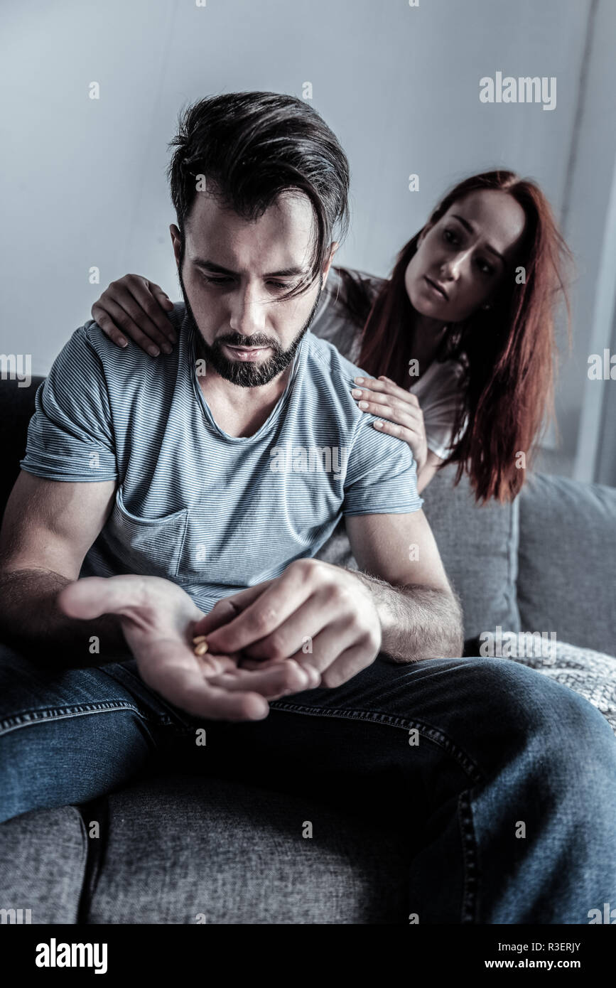 You can do it. Worried female person putting hands on shoulders of her ...