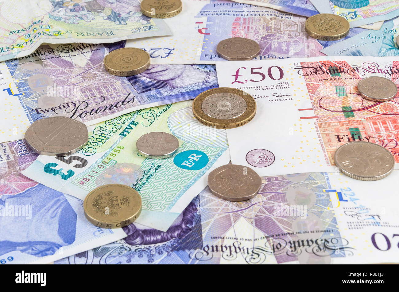 british pounds banknotes and coins background Stock Photo - Alamy