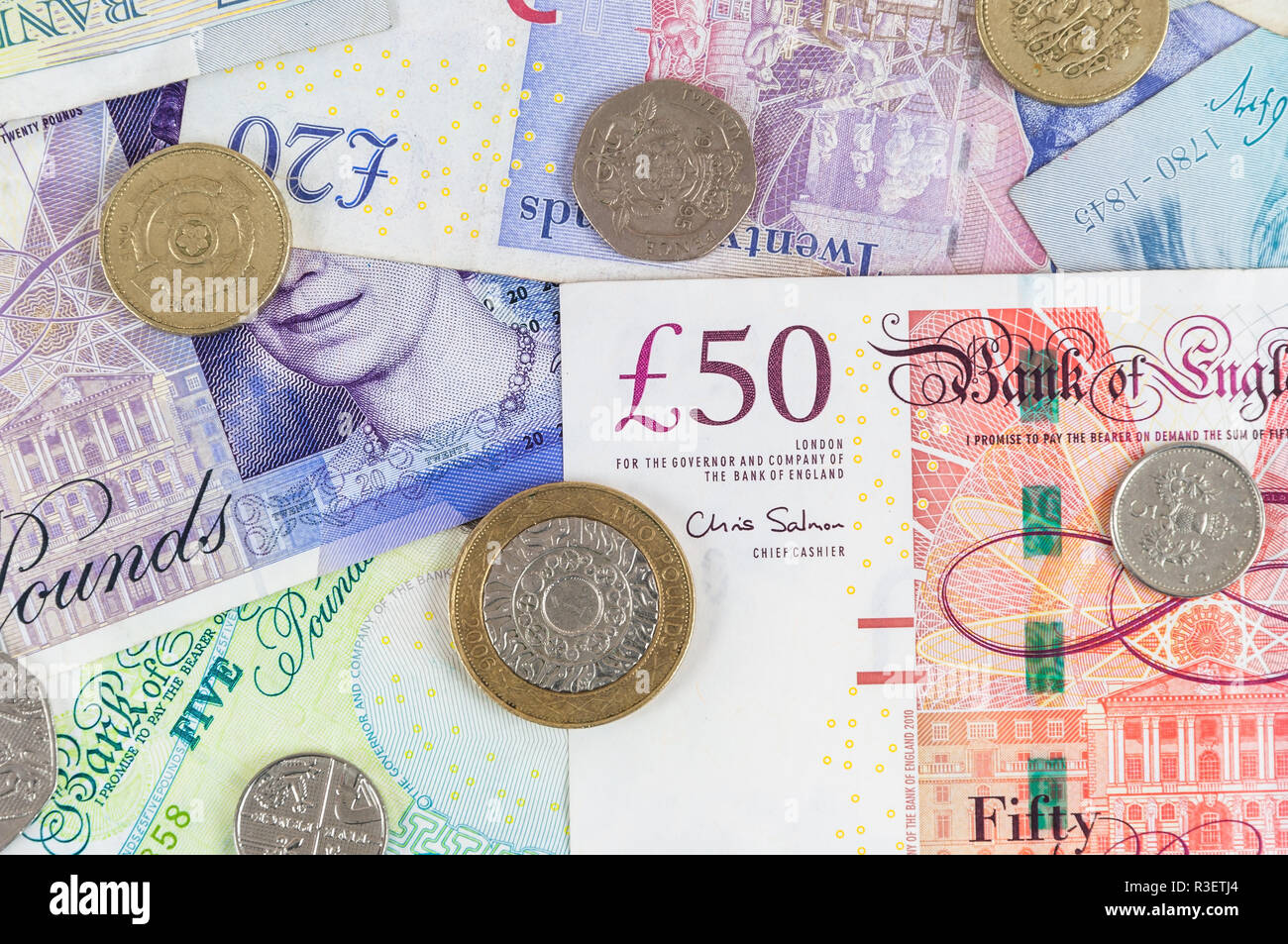british pounds banknotes and coins background Stock Photo - Alamy