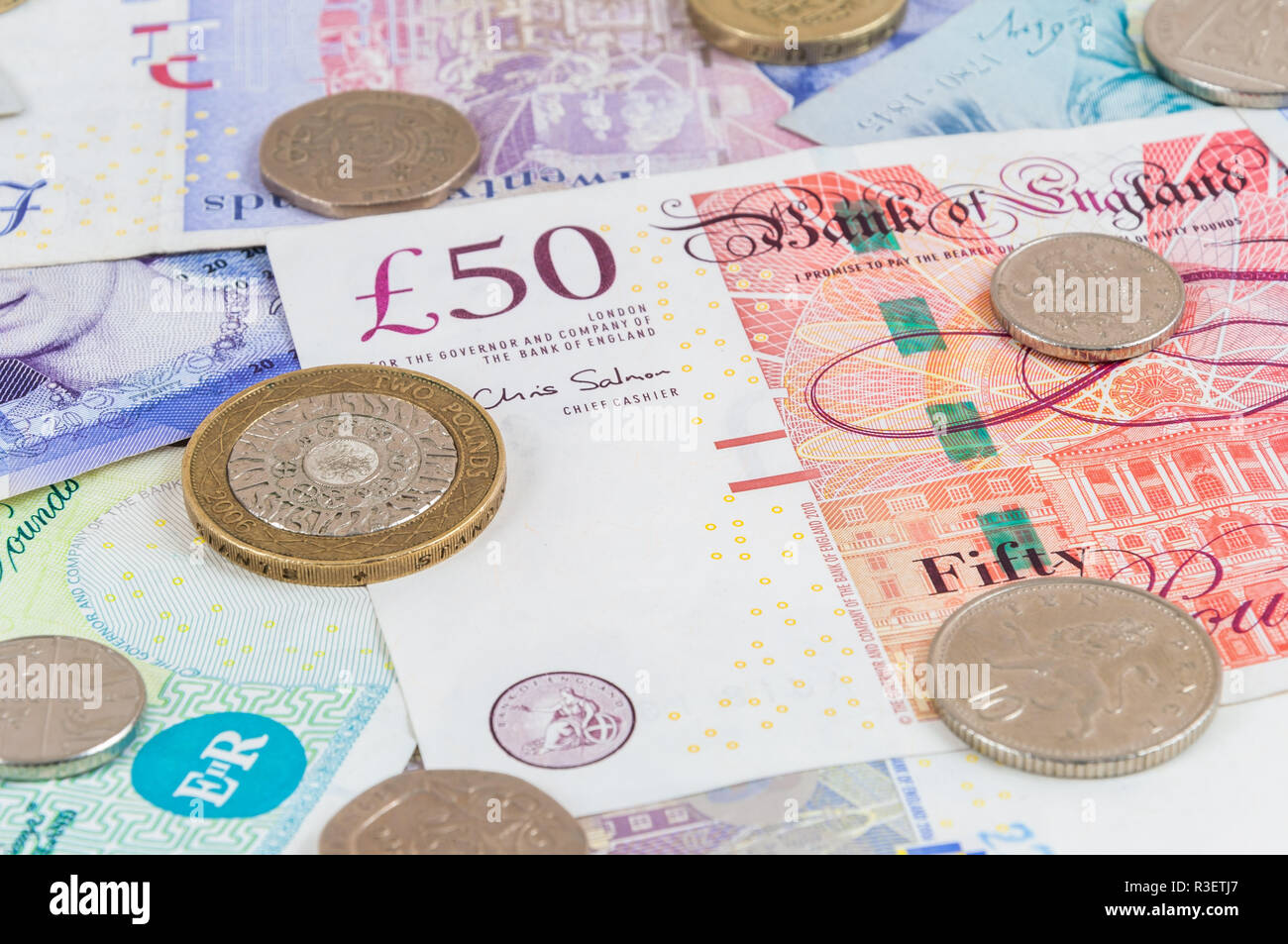 british pounds banknotes and coins background Stock Photo - Alamy