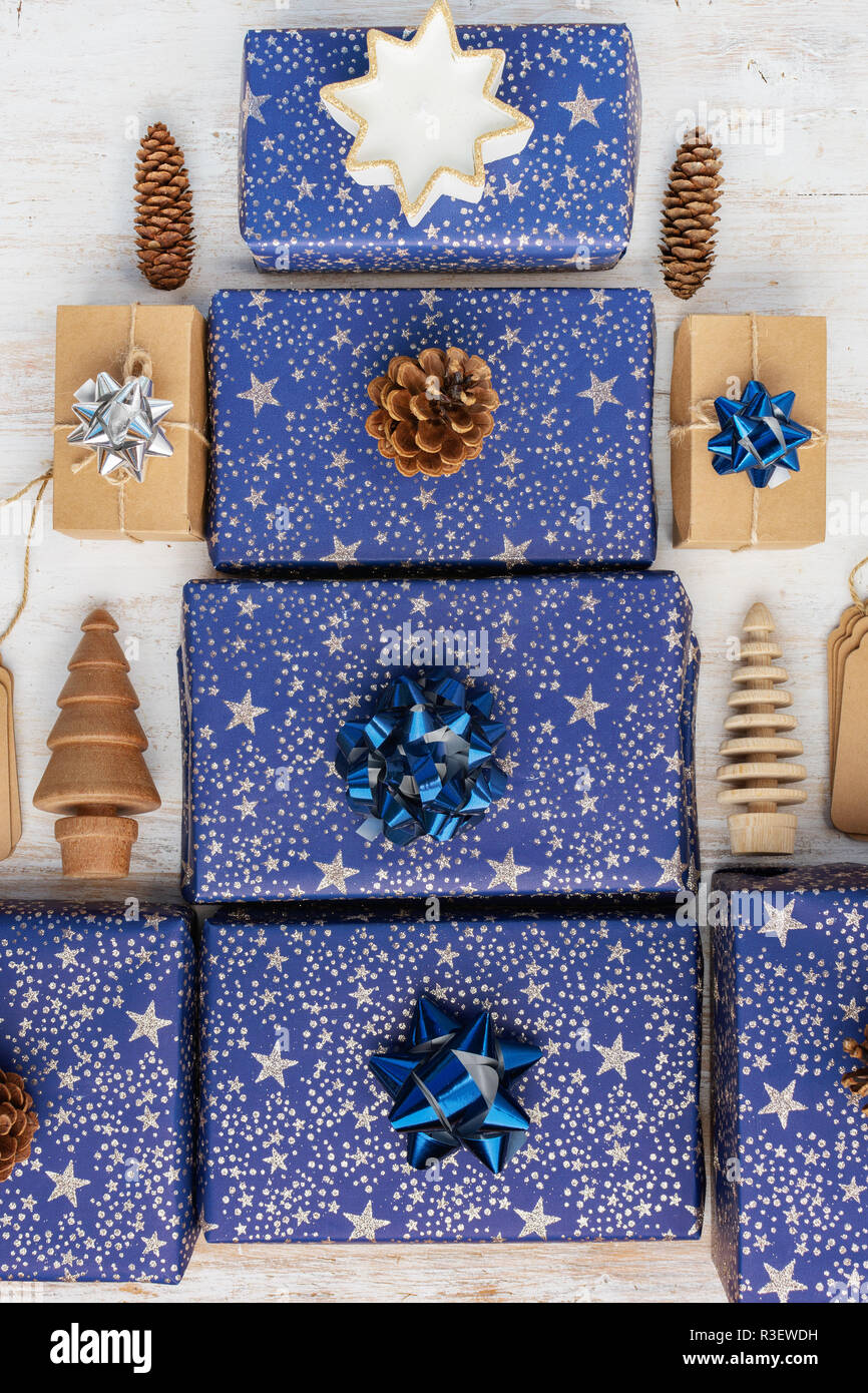 Creative Chritmas composition. Presents in blue wrapping paper with ...