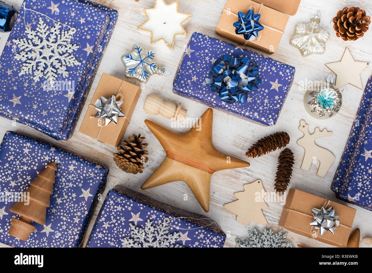 Creative chritmas composition. Presents in blue wrapping paper with ...
