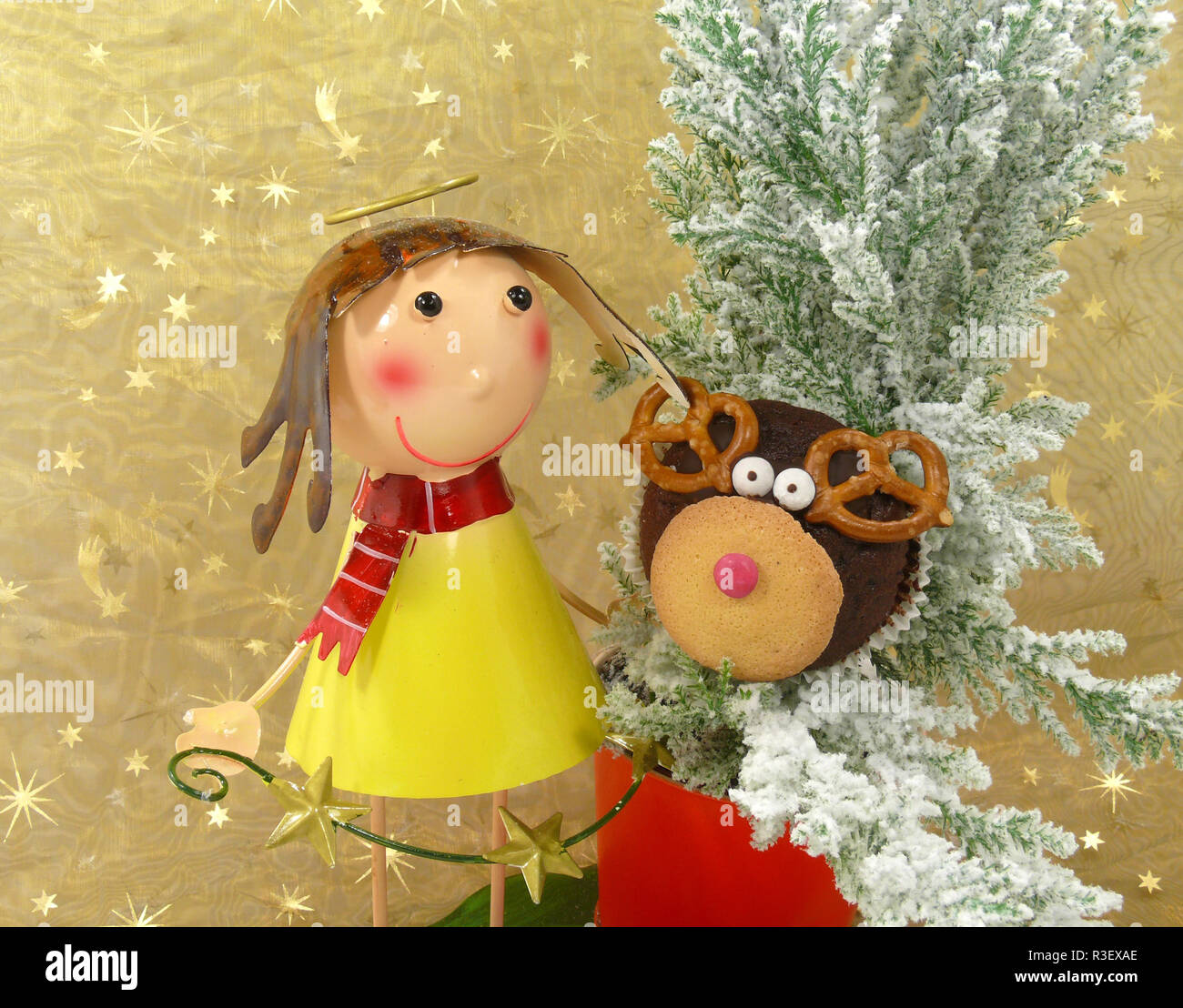 chocolate muffin and angel Stock Photo - Alamy