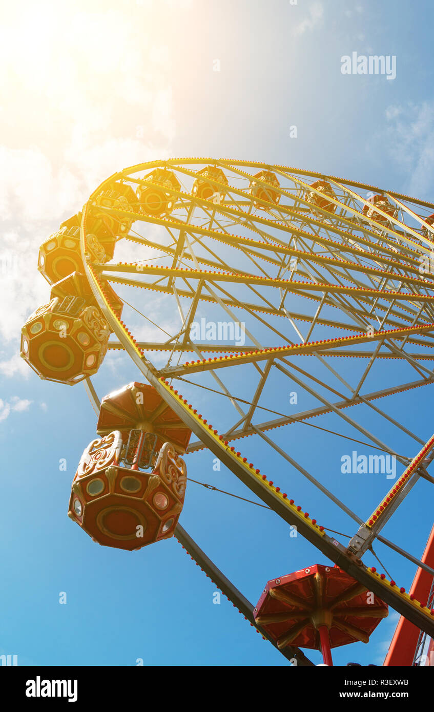 Red ferris wheel in the city park Stock Photo - Alamy