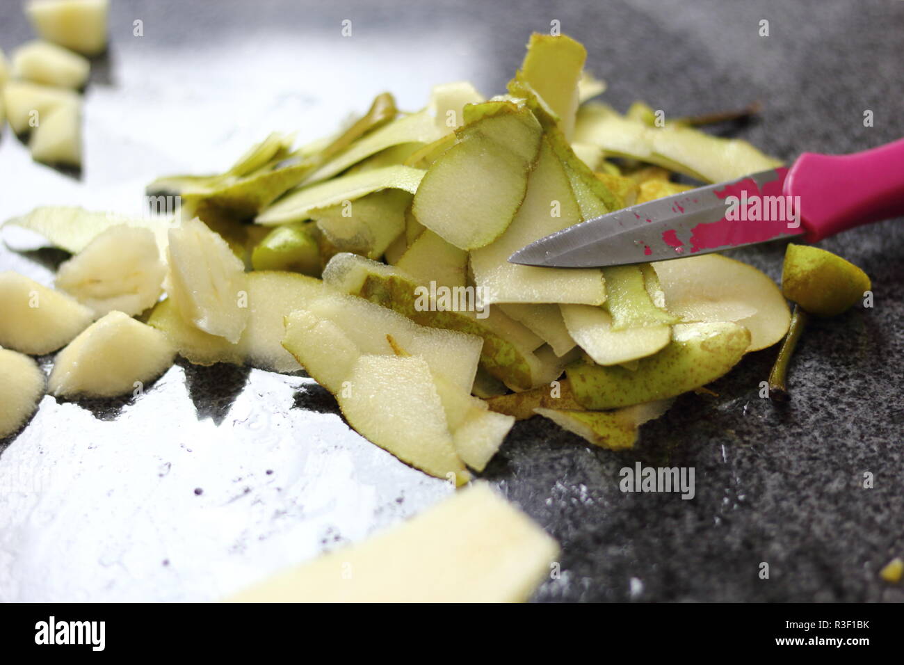 Pears skin on granite surface Stock Photo - Alamy