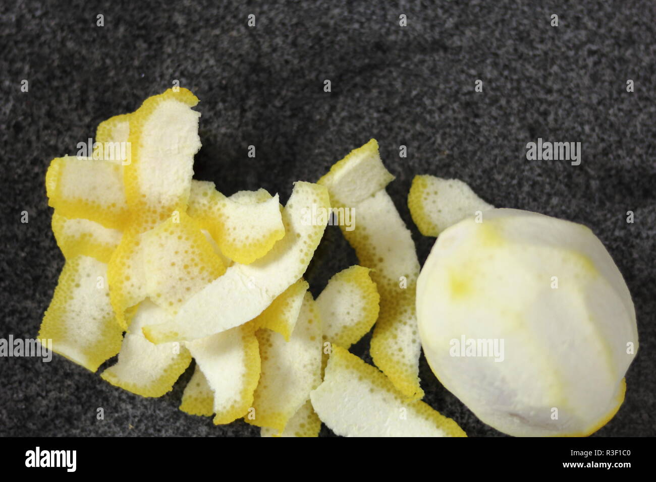 Peeled lemon and skins Stock Photo - Alamy