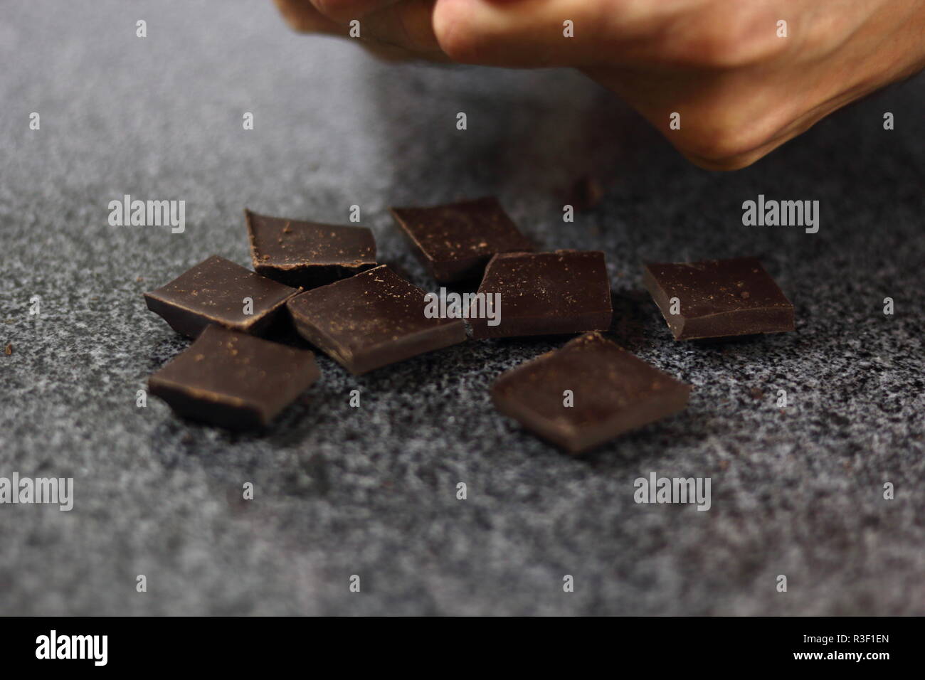 Breaking chocolate bar hi-res stock photography and images - Alamy