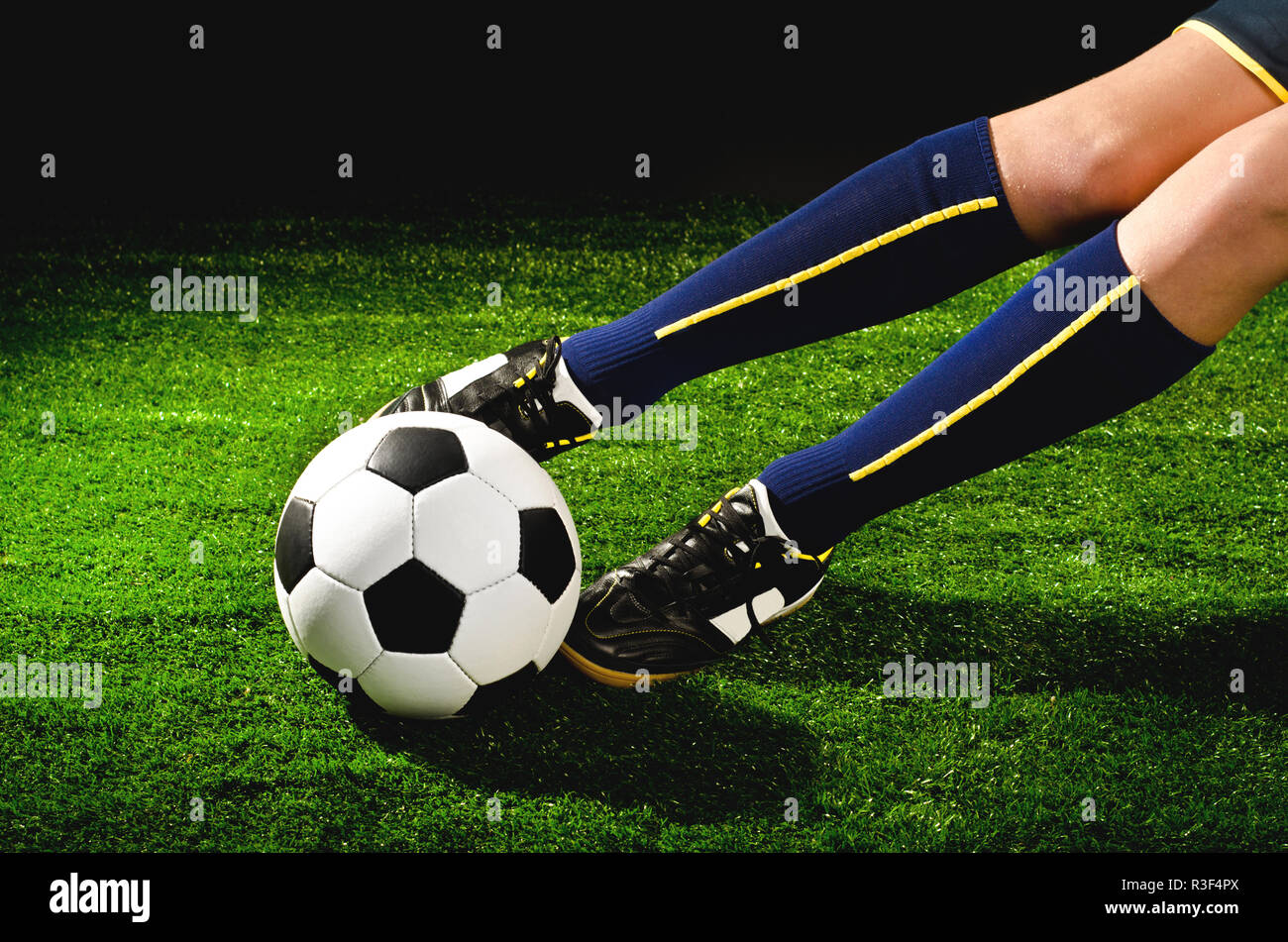 soccer player feet with ball closeup Stock Photo - Alamy