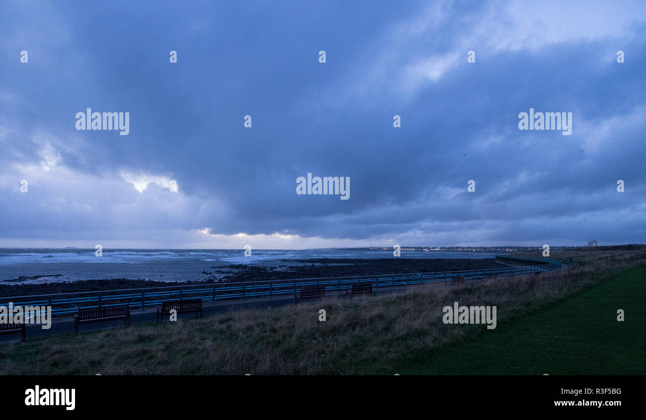 Early on a stormy November morning at St. Mary's Island, Whitley Bay ...