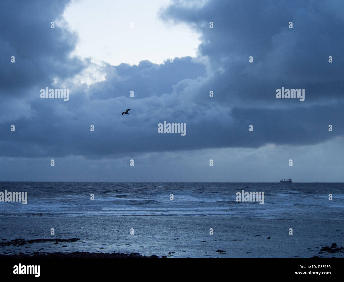Early on a stormy November morning at St. Mary's Island, Whitley Bay ...