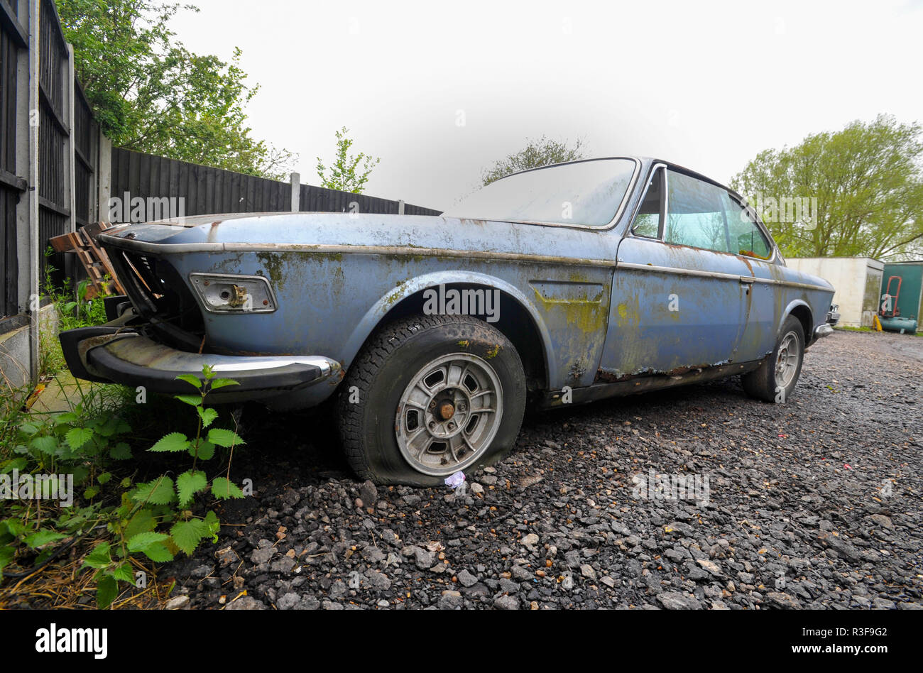Very rusty wreck classic BMW E9 classic sports car Stock Photo - Alamy