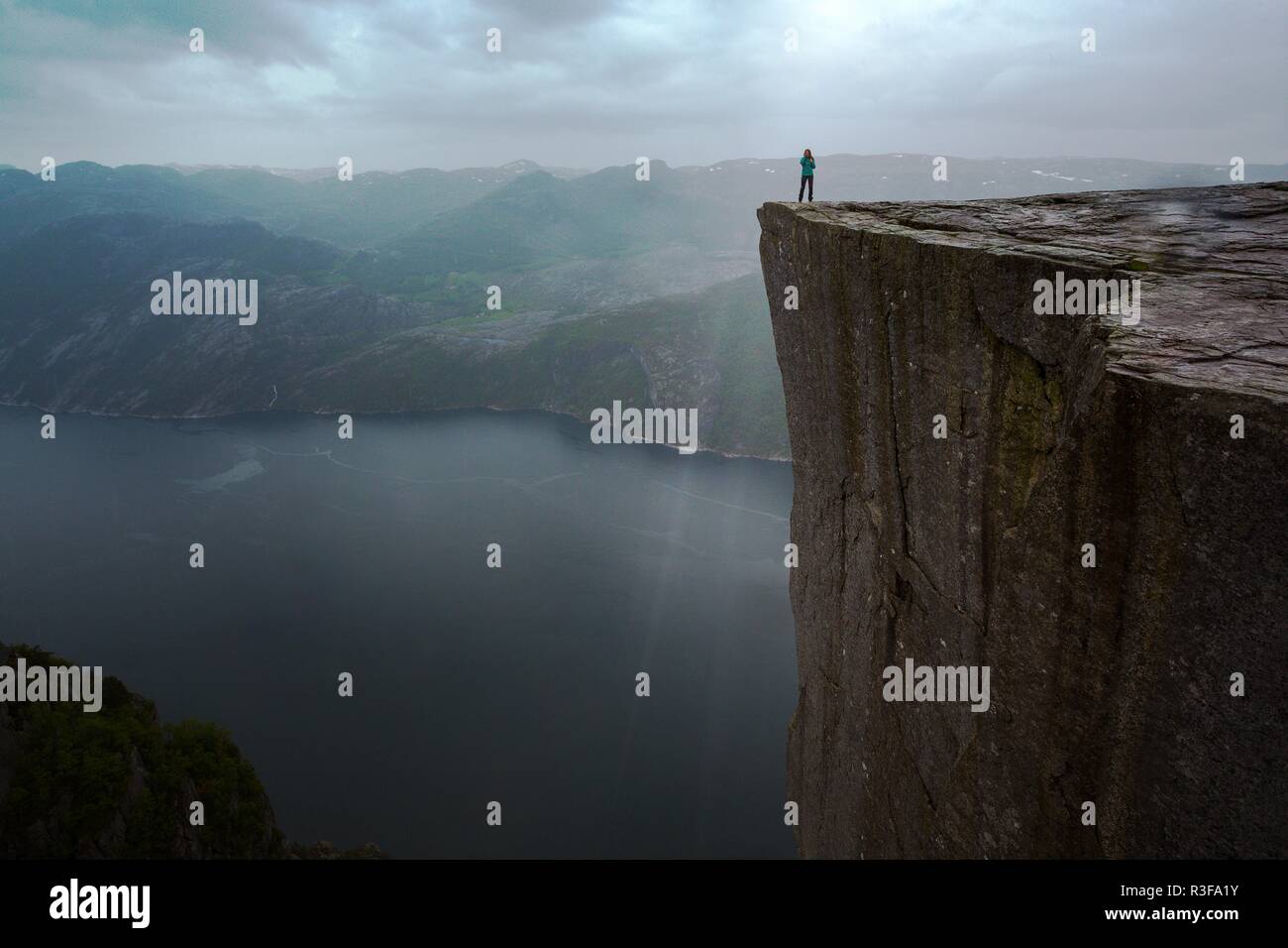 Hiker standing edge famous pulpit rock cliff hi-res stock photography ... Hiker standing edge famous pulpit rock cliff hi-res stock photography ...