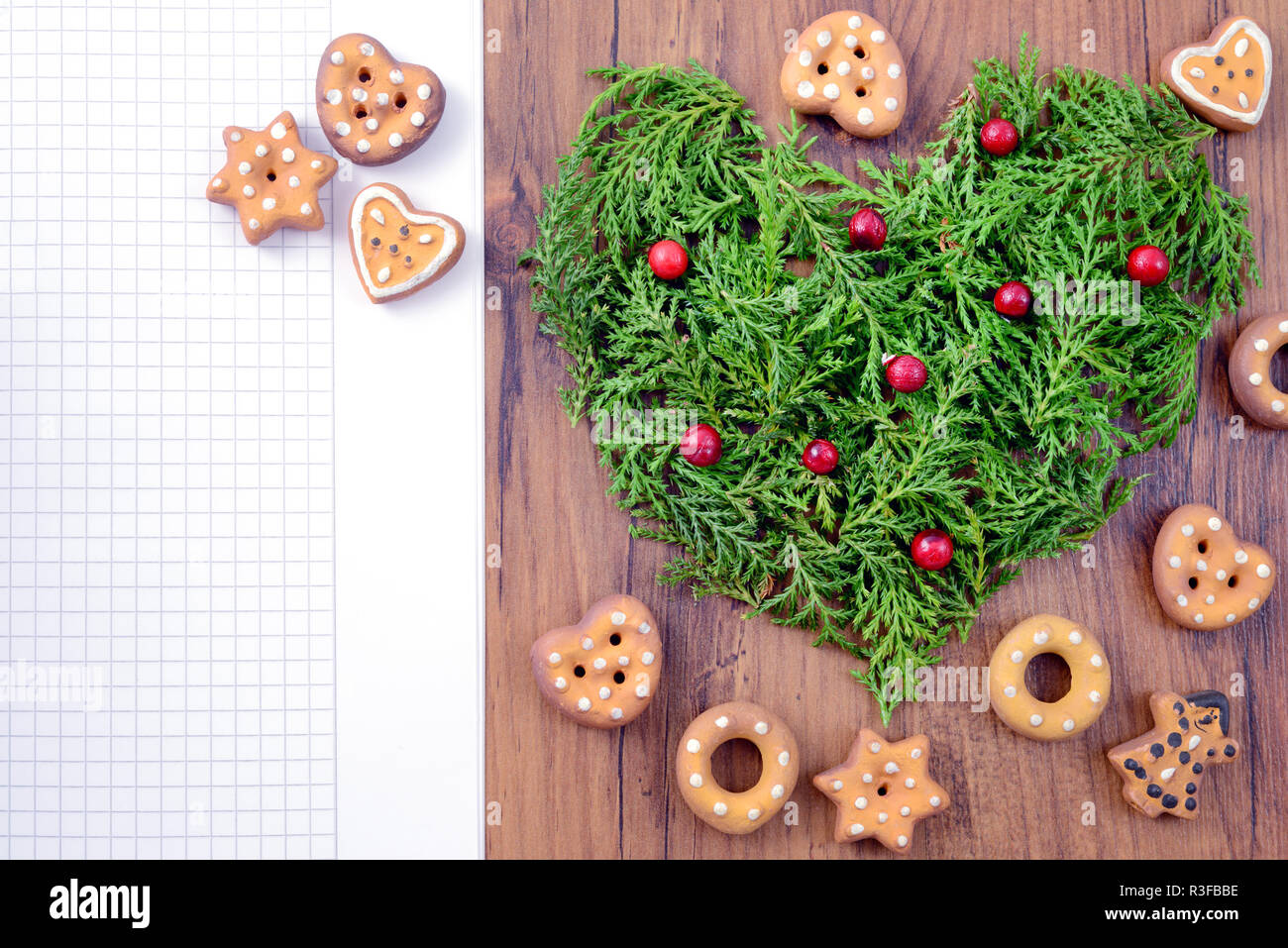 Christmas bake background with paper copy space. Cookies and heart of ...