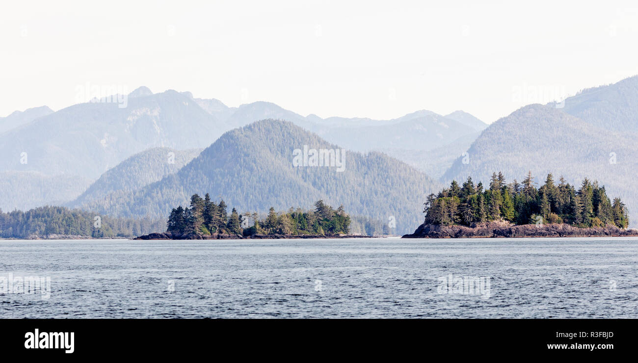 From the sea towards the land, small islands off the coast, Tofino area ...