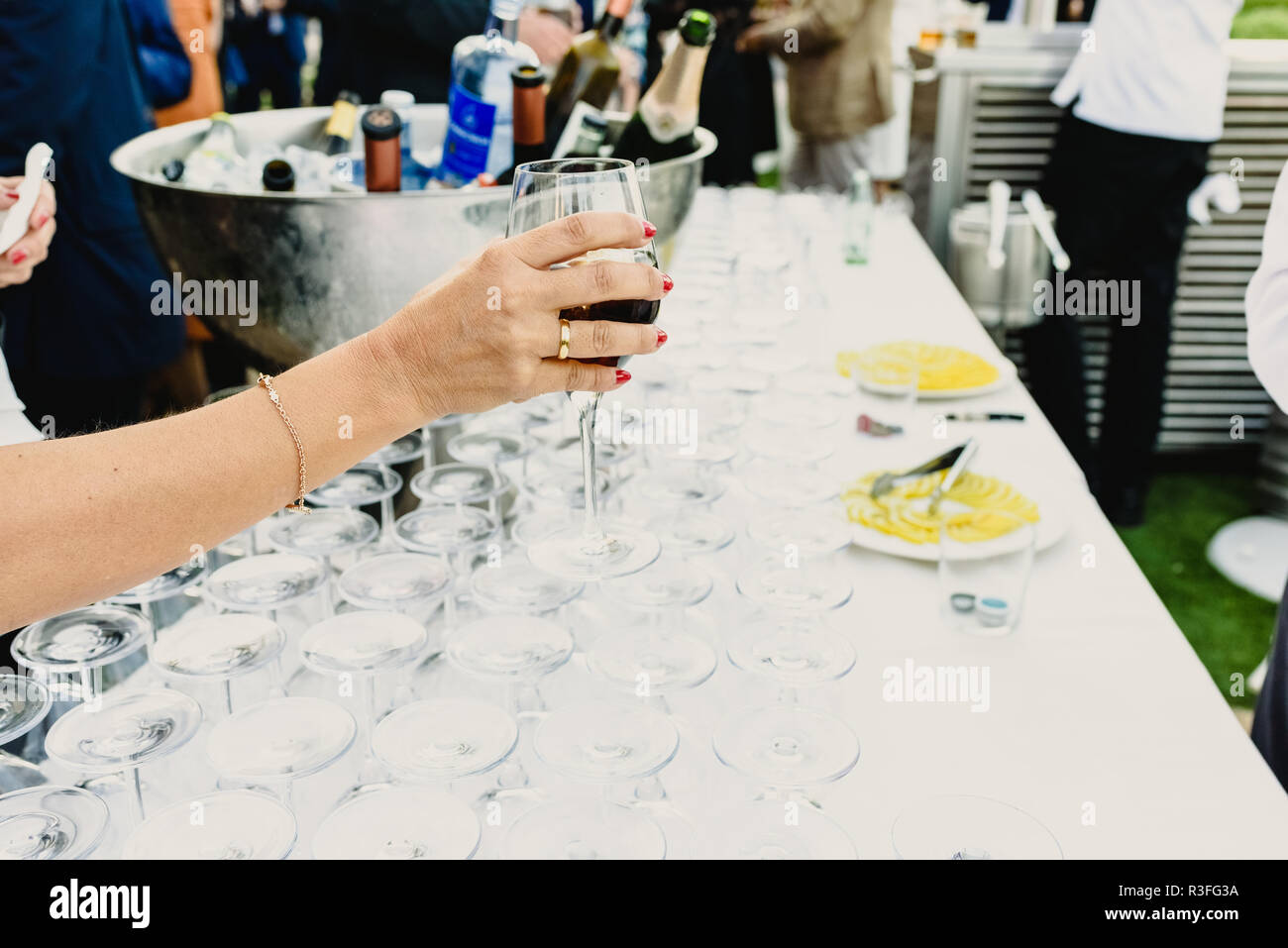 Guest drinks for a cocktail at a business event Stock Photo - Alamy