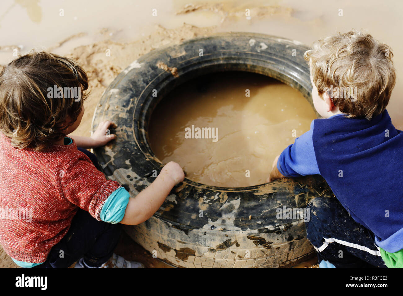 Child wheelbarrow dirt hi-res stock photography and images - Alamy