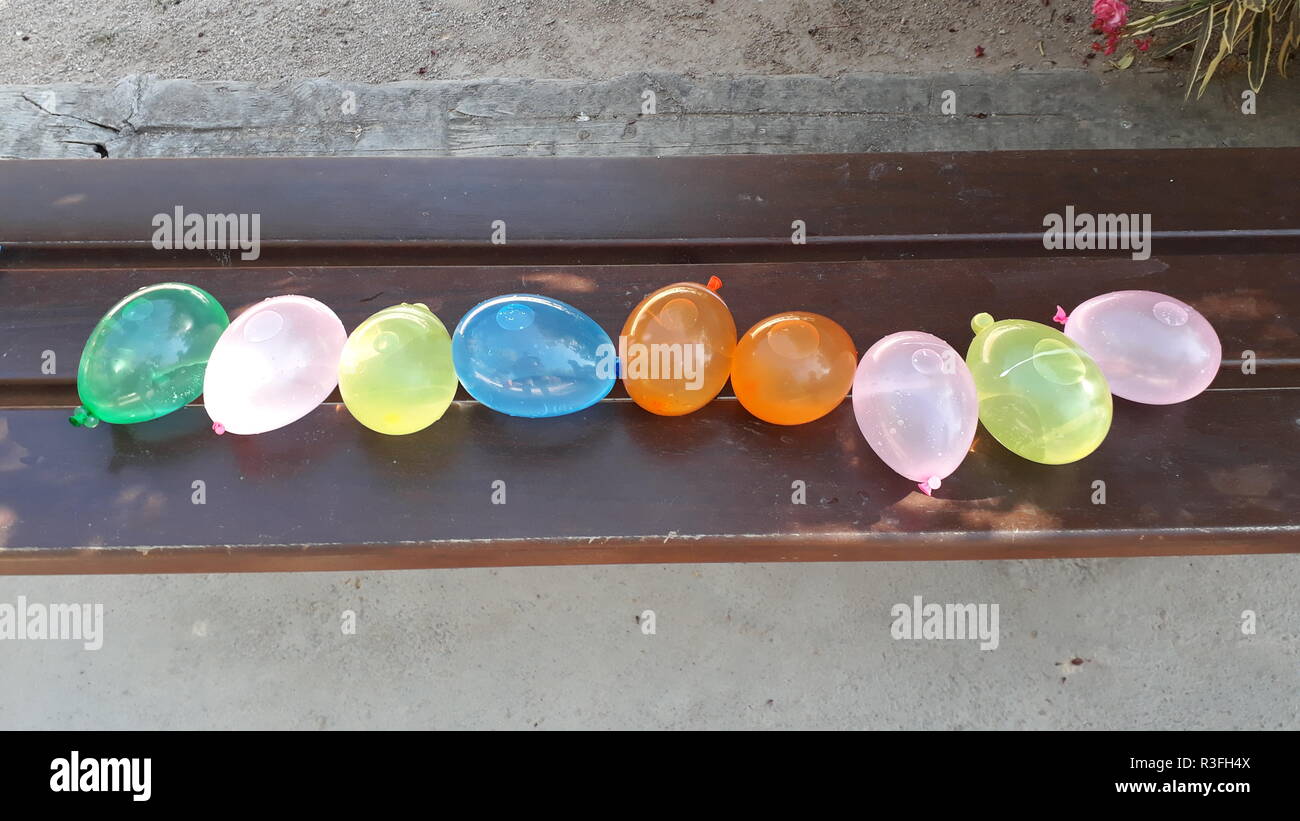 Water balloons filled with various colors to play Stock Photo - Alamy
