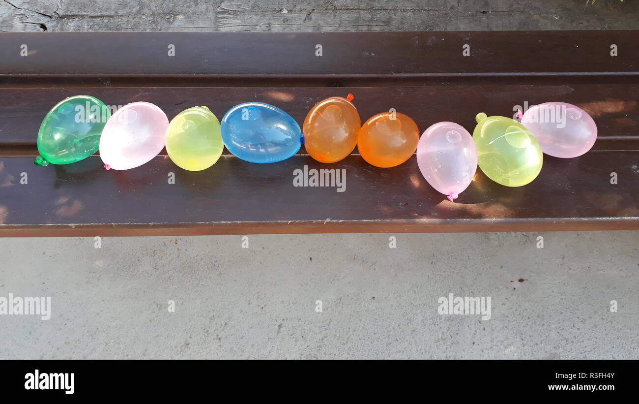 Water balloons filled with various colors to play Stock Photo - Alamy