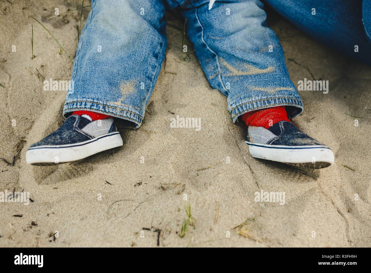 Feet and legs of children playing Stock Photo - Alamy