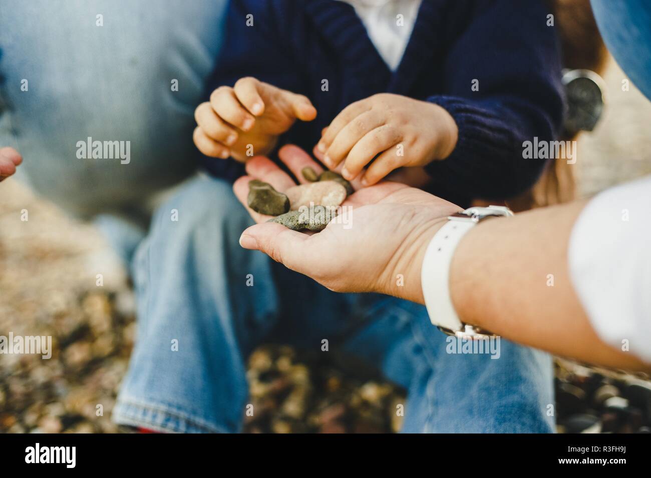 Hands of children doing things Stock Photo - Alamy