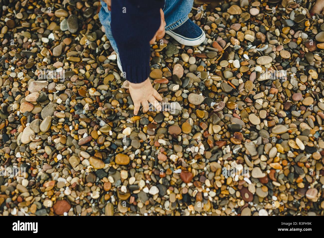 Feet and legs of children playing Stock Photo - Alamy