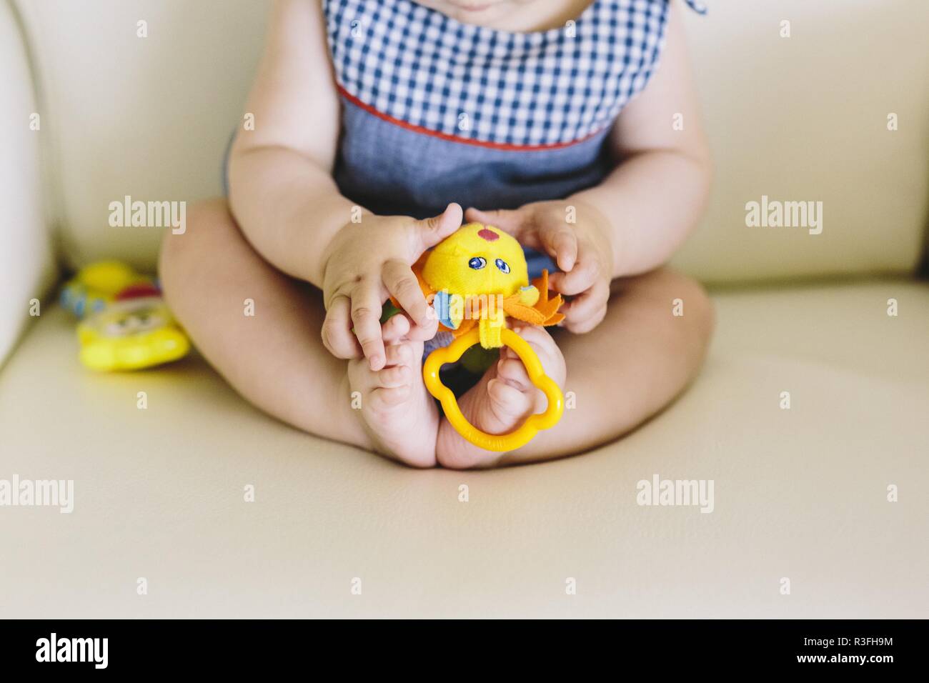 Feet and legs of children playing Stock Photo - Alamy