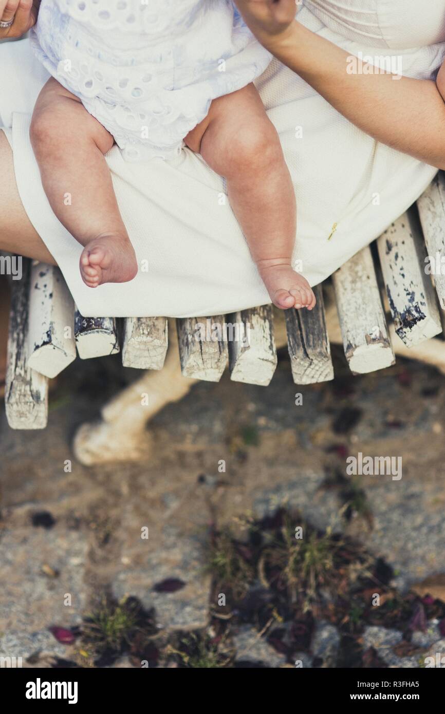 Feet and legs of children playing Stock Photo - Alamy