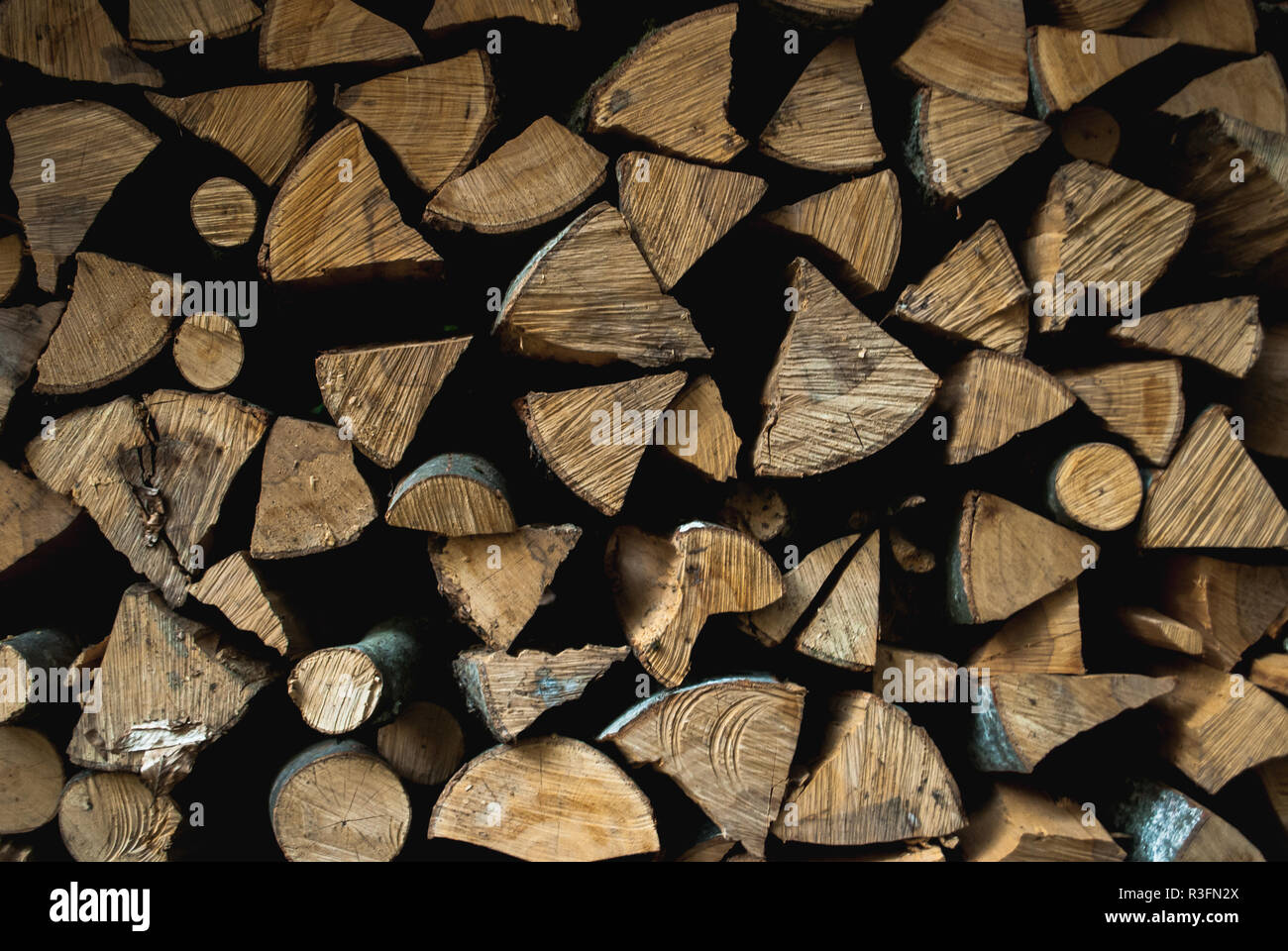 Abstract background of triangle firewood Stock Photo - Alamy