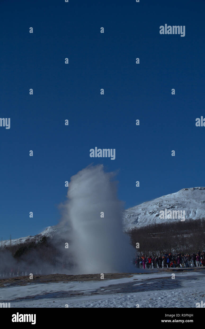 Erupting Strokkur geyser (geysir) in winter, The Golden Circle, Iceland ...