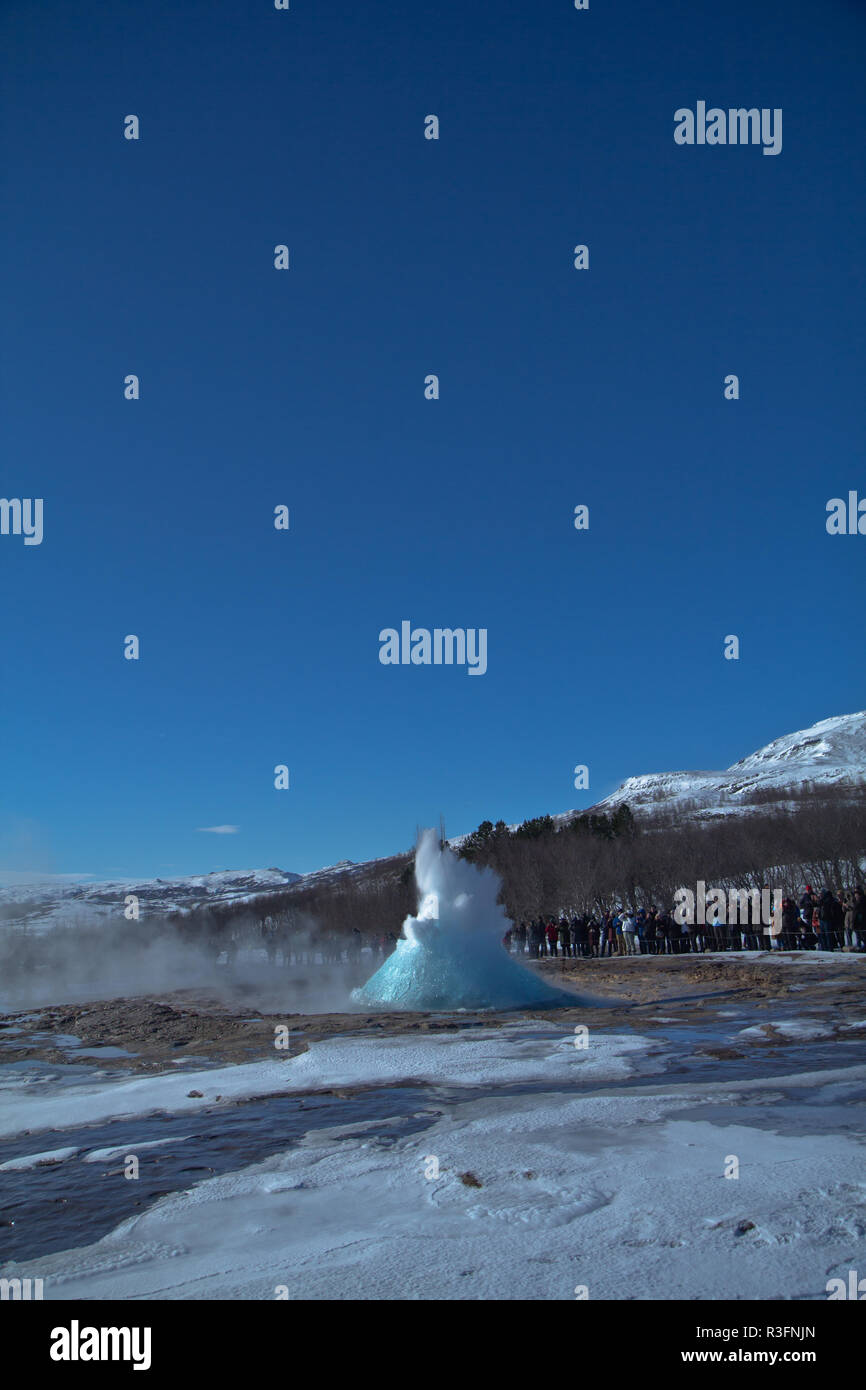 Erupting Strokkur geyser (geysir) in winter, The Golden Circle, Iceland ...