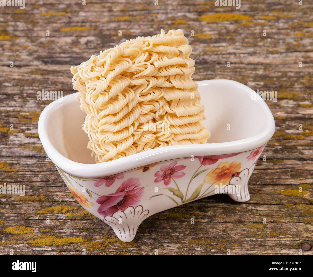 Chinese instant noodles. On a table of old boards. Close-up Stock Photo ...