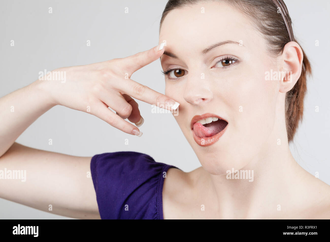young pretty woman with facial expressions Stock Photo - Alamy