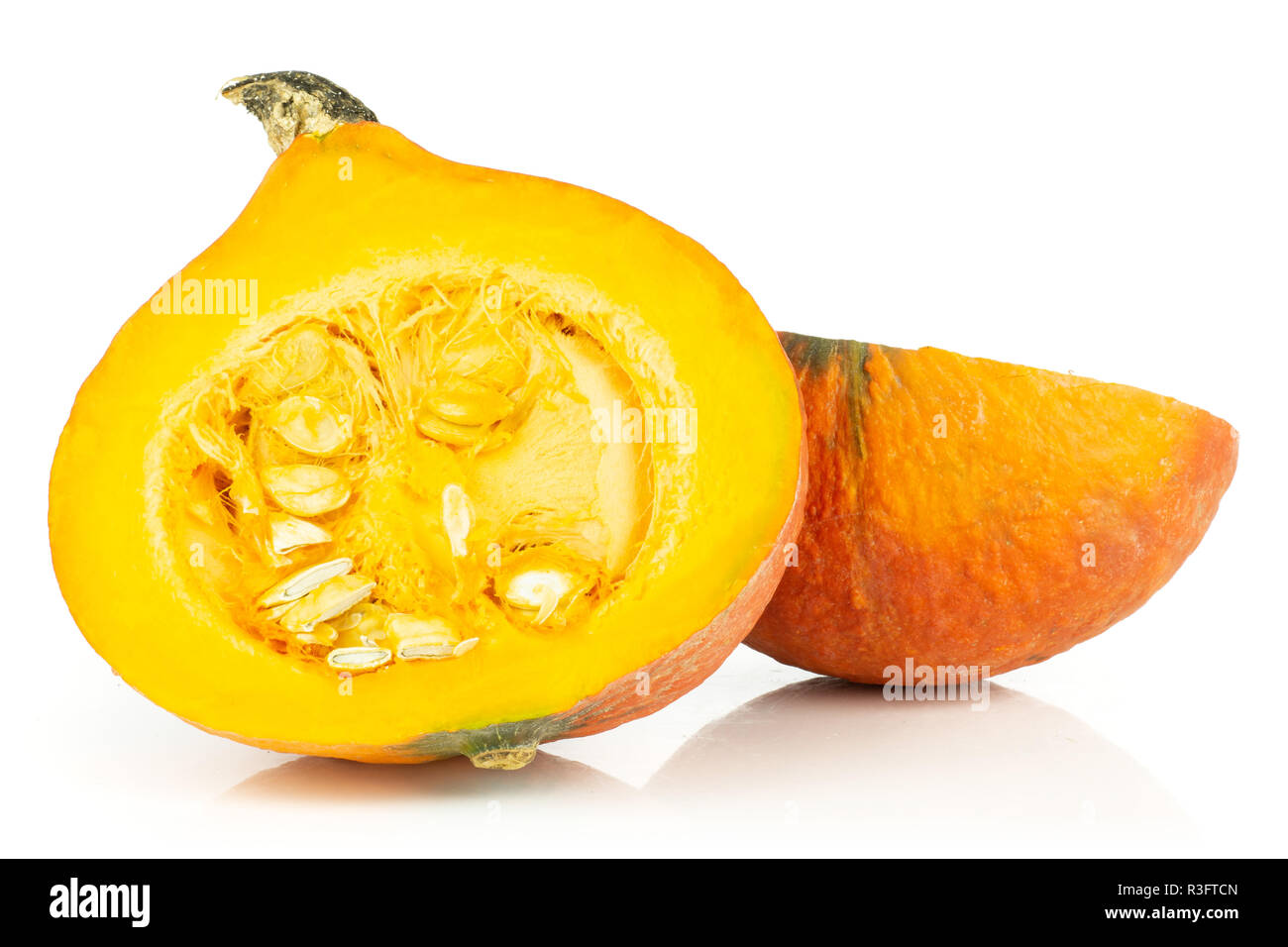 Group of two halves of fresh red kuri pumpkin hokkaido variety with ...
