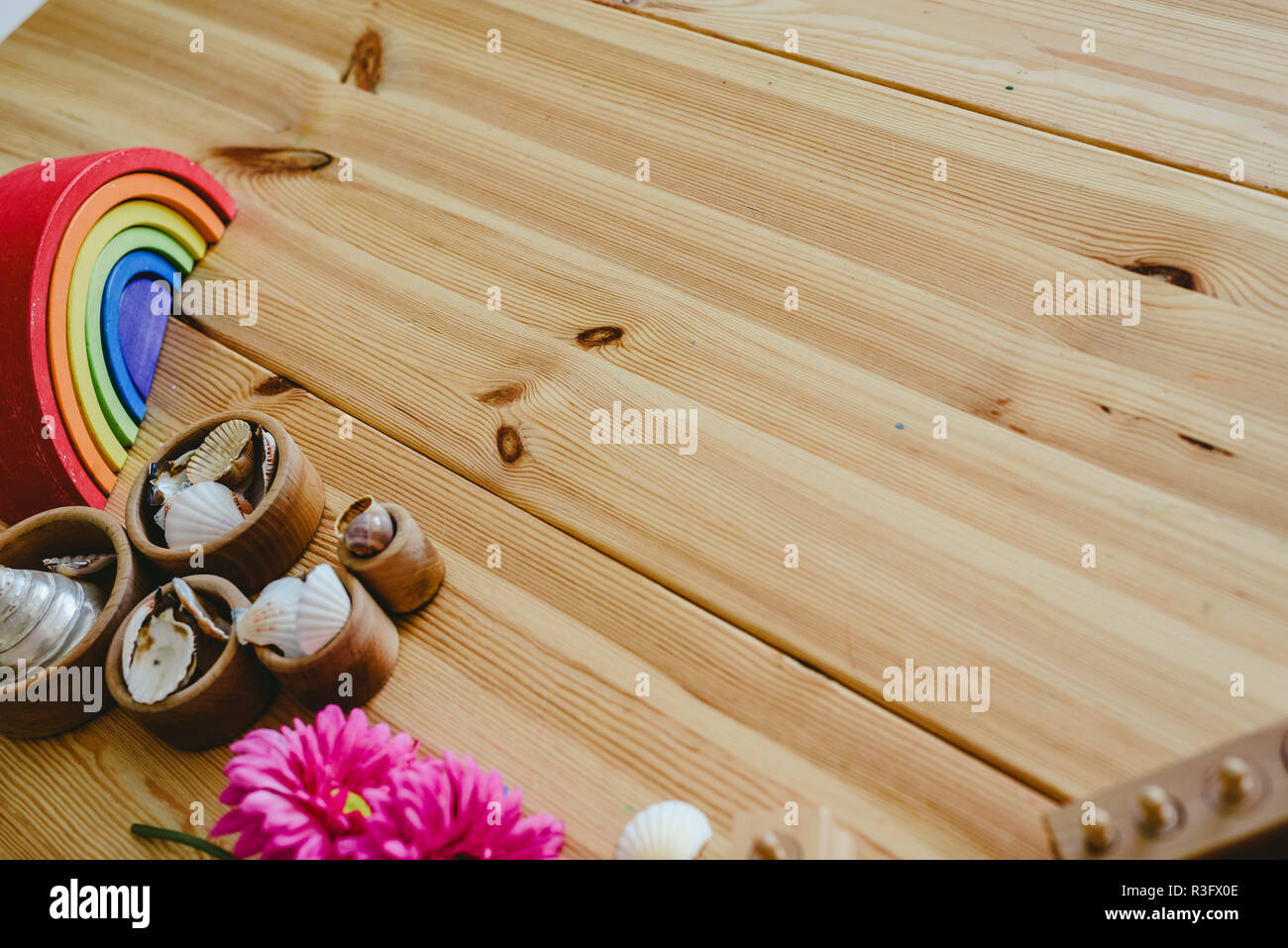 Group of learning materials of round and wooden colors on wooden table ...