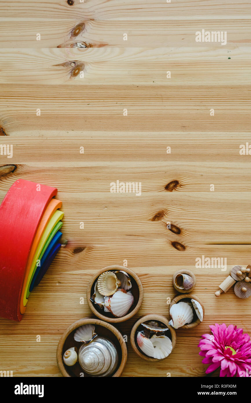 Group of learning materials of round and wooden colors on wooden table ...