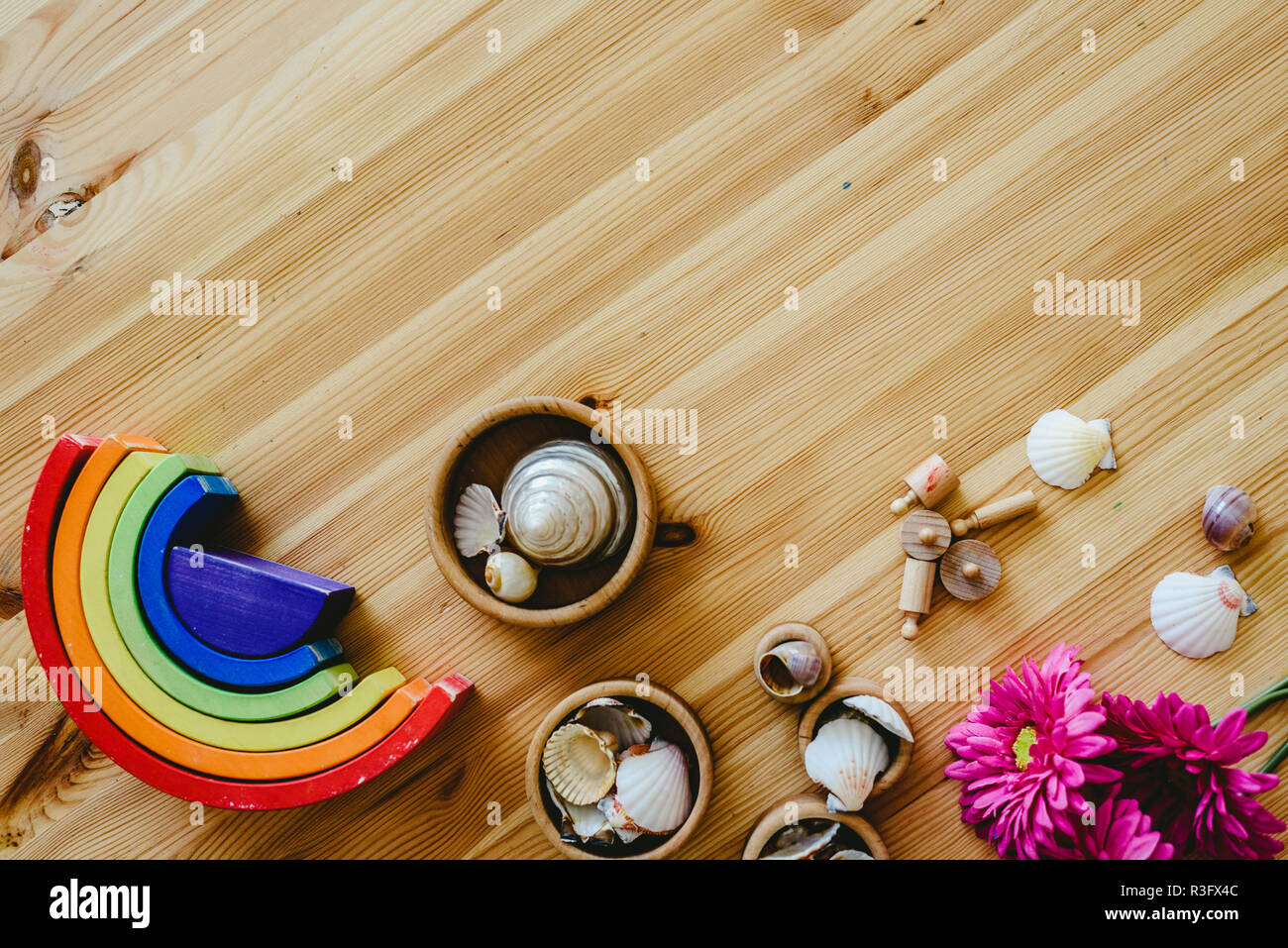Group of learning materials of round and wooden colors on wooden table ...
